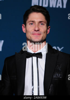 Matthew MacCaull attends the world premiere of "Midway" at the Regency ...