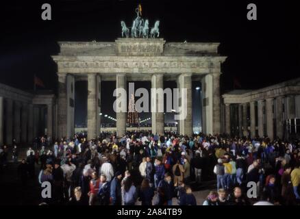 Berlin (Germany), January 1990. Germans celebrating the fall of the ...