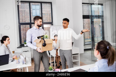 executive seeing off sad fired male office worker Stock Photo - Alamy