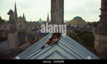 London.UK. Dafne Keen and shape shifting daemon Pantalaimon (voiced by ...