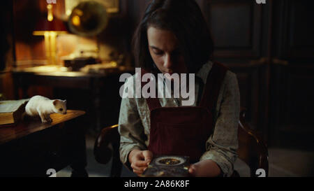 London.UK. Dafne Keen and shape shifting daemon Pantalaimon (voiced by ...