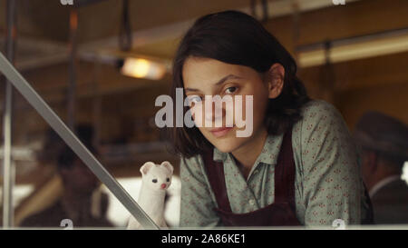 London.UK. Dafne Keen and shape shifting daemon Pantalaimon (voiced by ...