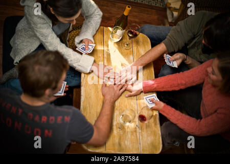 Woman playing snap card game Stock Photo - Alamy