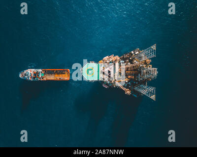 Aerial view of an oil drilling rig in the tidal currents of Cook Inlet ...