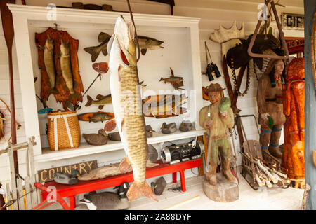 Wooden carving and taxidermy Muskie fish at a country store in the ...