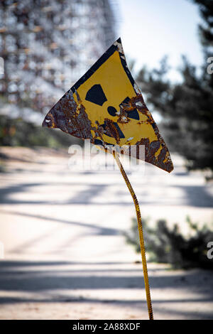 Radiation sign. Nuclear hazard emblem, grunge textured. Radioactive ...