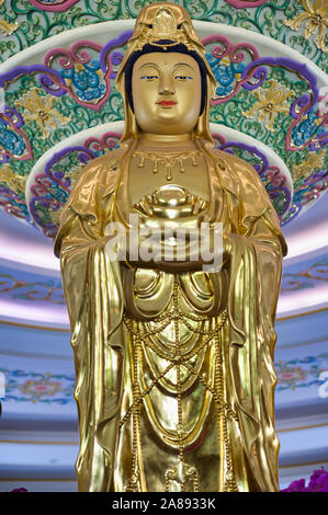 Statue of Guan Yin inside buddhist temple on the Putoshan island, China ...