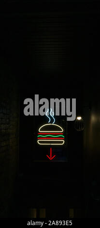 A neon red burger sign in the Broadway Theatre District in NYC Stock ...