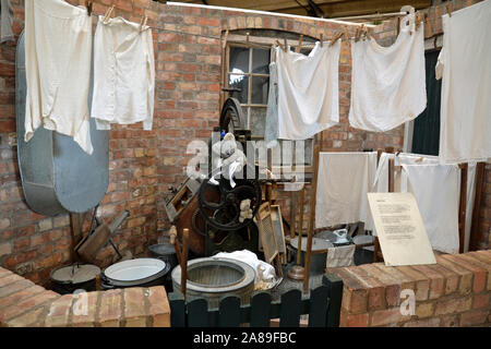 Victorian clothes hanging on washing line Stock Photo - Alamy