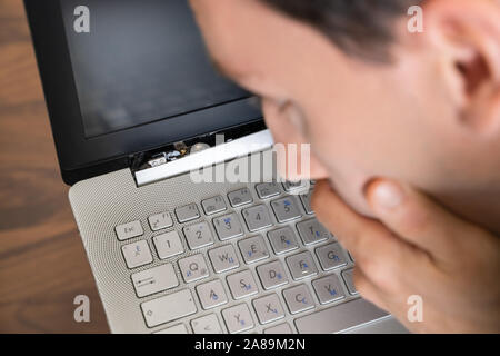 Smashed computer keyboard Stock Photo - Alamy
