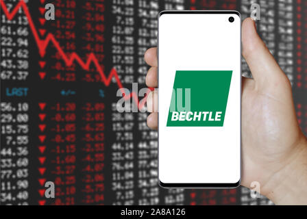 Logo of public company Bechtle AG displayed on a smartphone. Flag of ...