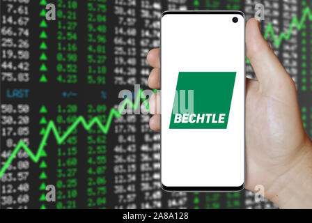 Logo of public company Bechtle AG displayed on a smartphone. Flag of ...
