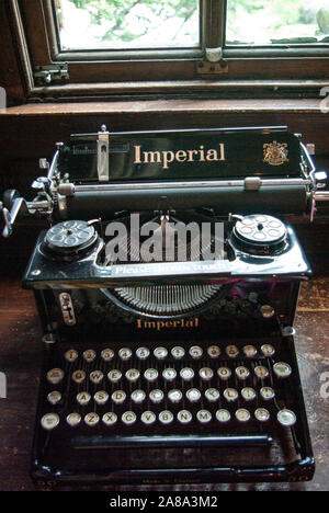 Details of an old retro typewriter in vintage style with dusty surfaces ...