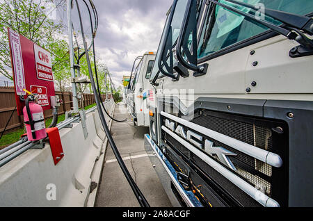 CNG-powered (compressed natural gas) Mack trucks line up at Waste Pro’s ...