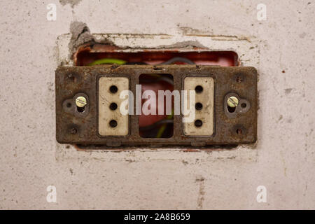 Very old and unsafe electric plug socket with dangerous wiring and ...