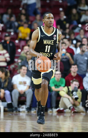 Wake Forest guard Torry Johnson (11) brings the ball up as he is ...