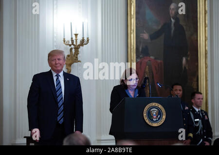 Susan Rescorla, the widow of Richard Rescorla, accepts the Presidential ...