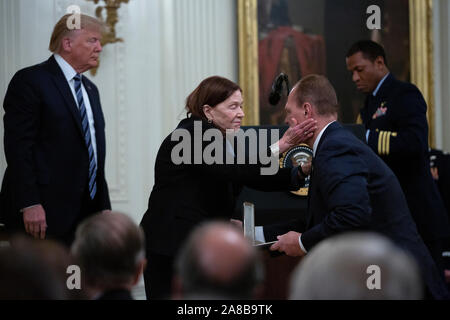 Susan Rescorla, the widow of Richard Rescorla, accepts the Presidential ...