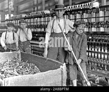 A textile mill. Sweeper and doffer boys in Lancaster Cotton Mills ...