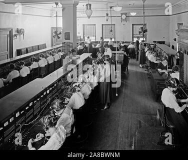 An early 20th century telephone switchboard containing 50 double lines ...