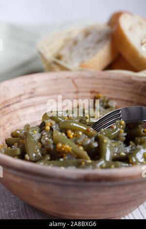 Cooked French bean with fried onions, garlic and mustard Stock Photo ...