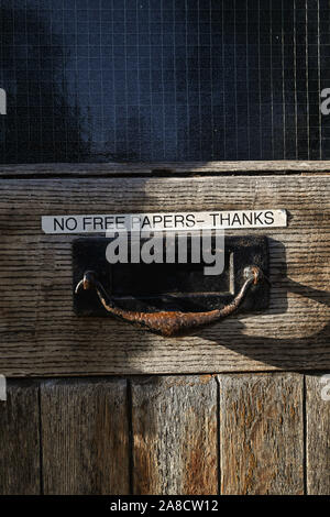 NO FREE PAPERS - THANKS sign pictured on a letter box in Warwickshire ...
