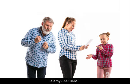 Family members arguing with one another on white studio background ...
