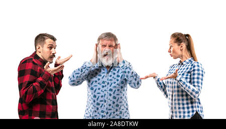 Family members arguing with one another on white studio background ...