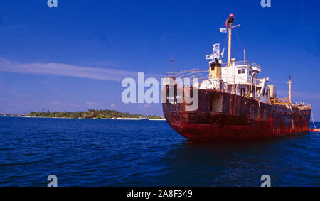 Maledives: A shipwreck near the the island Makafushi in the Indian ...