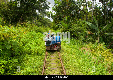 Riding a motorcycle brujita on disused railway tracks to the village of ...