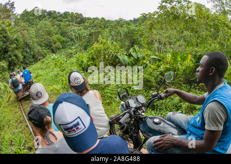 Riding a motorcycle brujita on disused railway tracks to the village of ...
