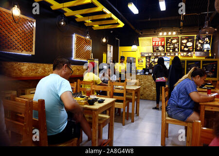 PASIG CITY, PHILIPPINES – NOVEMBER 3, 2019: Signage in the facade of a ...