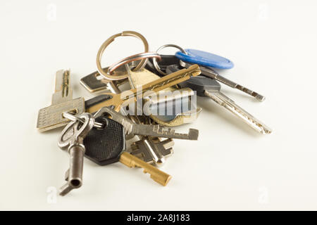 large bunch of different keys isolated on a white background Stock ...