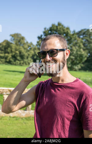 Young man calling stock photo Stock Photo - Alamy