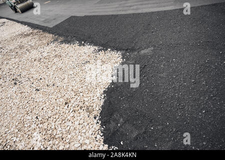 Repair pavement and laying new asphalt patching method outdoors Stock ...