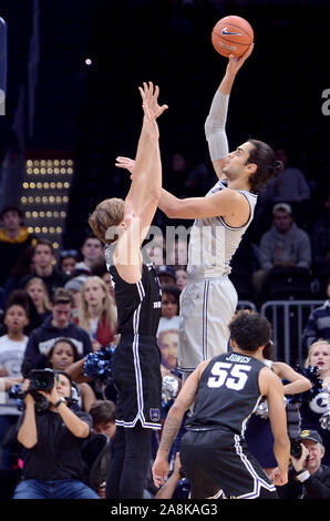 Georgetown center Omer Yurtseven (44) shoots as Duke forward Jack White ...