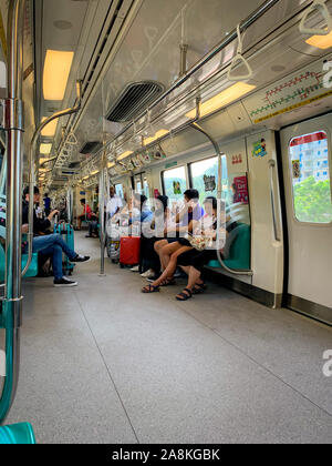 Metro Train At The Airport In Singapore About To Depart Stock Photo - Alamy