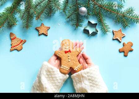 Christmas cookies. Top view of female hands holding, cooking raw ...