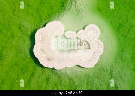 Aerial image of a Round shaped Salt deposit in the heart of the Dead ...
