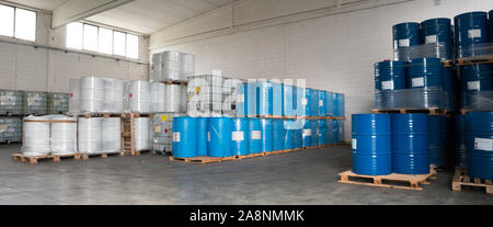 Chemical drums stored in warehouse Katalco UN3077 Chemical Catalyst ...