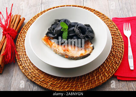 original italian ravioli with squid ink Stock Photo - Alamy
