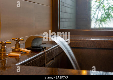 Bathtub and washbasin in hot spring soup house ( shower, spa, steam ...