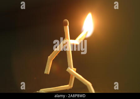 running matchstick man on fire 2 Stock Photo - Alamy