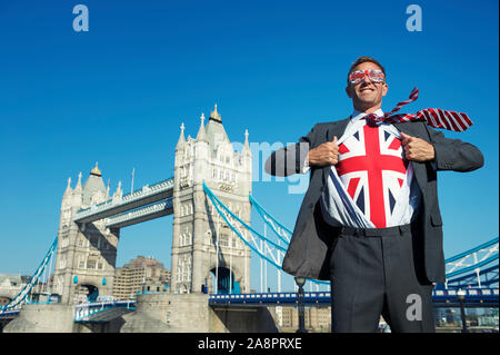 Patriotic British businessman pulling open his suit to reveal inner ...