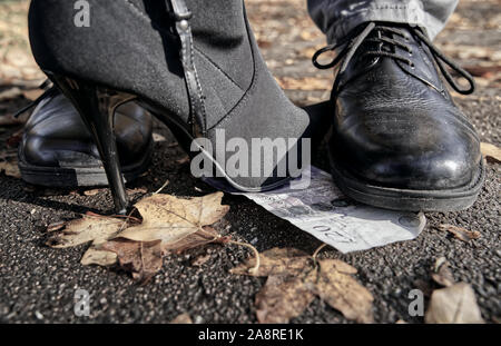 The lucky man is finding the money in the street on the floor. The ...