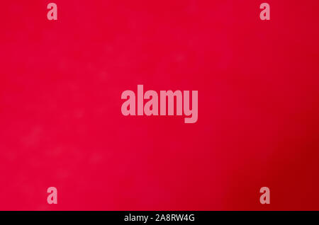 Red paper texture background with light cream circle and copy space for ...