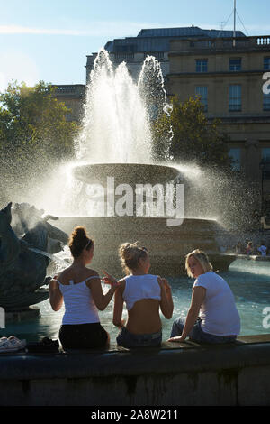 People cool off at a fountain in Rome, Tuesday, June 23, 2026. (AP ...