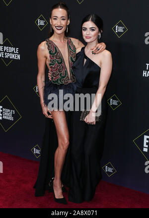Actresses Maggie Q and Lucy Hale arrive at the 2019 E! People's Choice ...