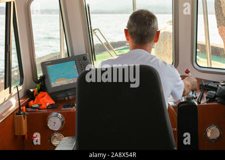 Tug boat captain cockpit tugboat operator driver pilot cab Stock Photo ...