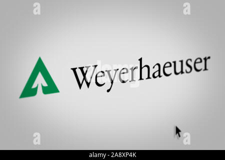 Logo of public company Weyerhaeuser displayed on a smartphone. Grey ...
